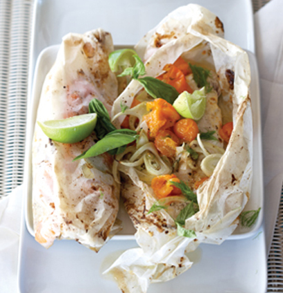 Baked fish and squashed tomato parcels | Woolworths TASTE