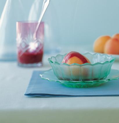 Poached peaches with raspberry-grenadine sauce | Woolworths TASTE