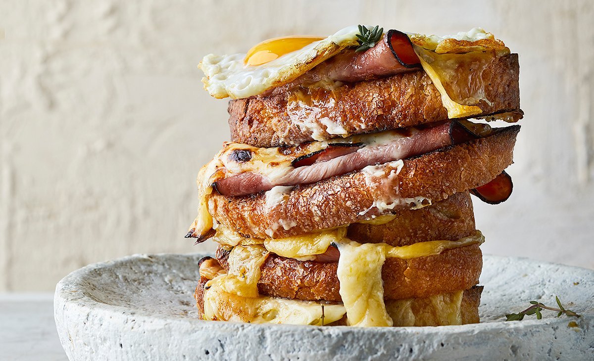 Croque madame recipe made with two cheeses, ham and fried egg