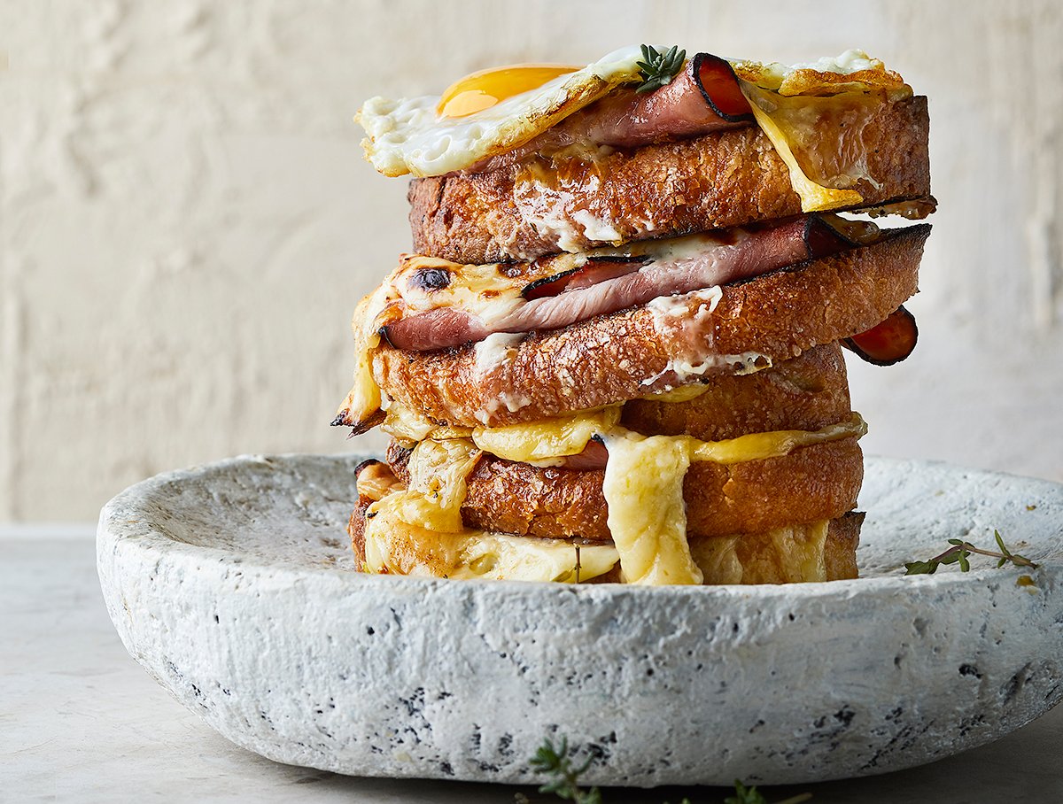 Croque madame recipe made with two cheeses, ham and fried egg
