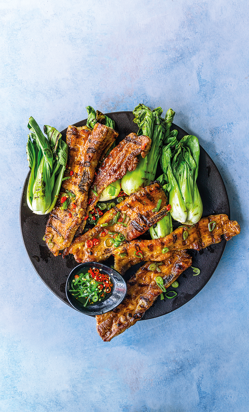 Grilled pork rashers and pak choi with soya, chilli and spring onion ...