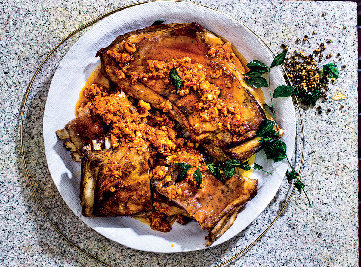 Whole roast lamb ribs with romesco sauce | Woolworths TASTE