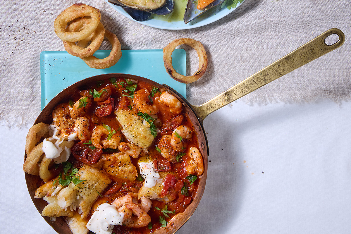Hake and prawn skillet | Woolworths TASTE