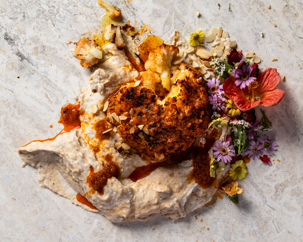 Harissa-roasted cauliflower with white bean purée | Woolworths TASTE